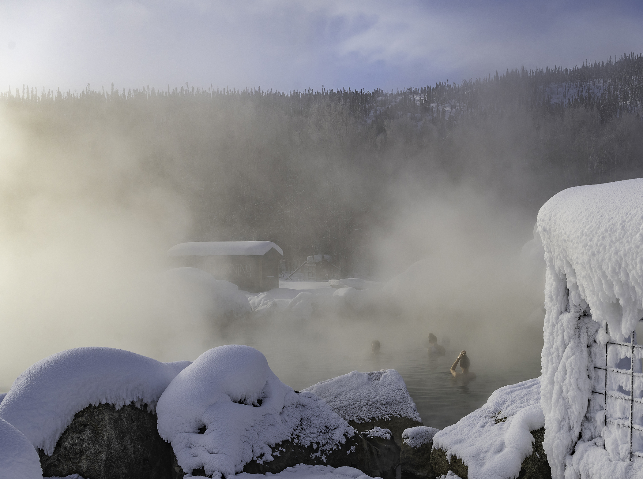 Hot-springs-steam-bathers - TravelWorld International Magazine